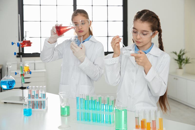 Smart Pupils Making Experiment in Class Stock Image - Image of chemical ...