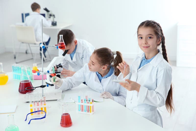 Smart Pupils Making Experiment at Table in Class Stock Photo - Image of ...