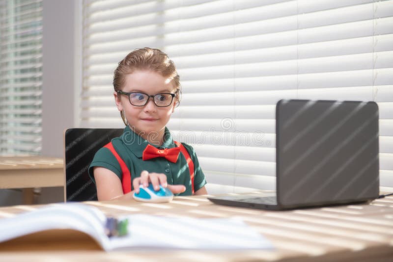 Smart School Boy at Home Writing Homework. Little Student with Notebook ...