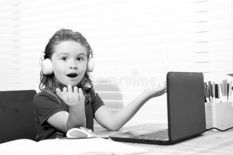 Smart School Boy at Home Writing Homework. Little Student with Notebook ...