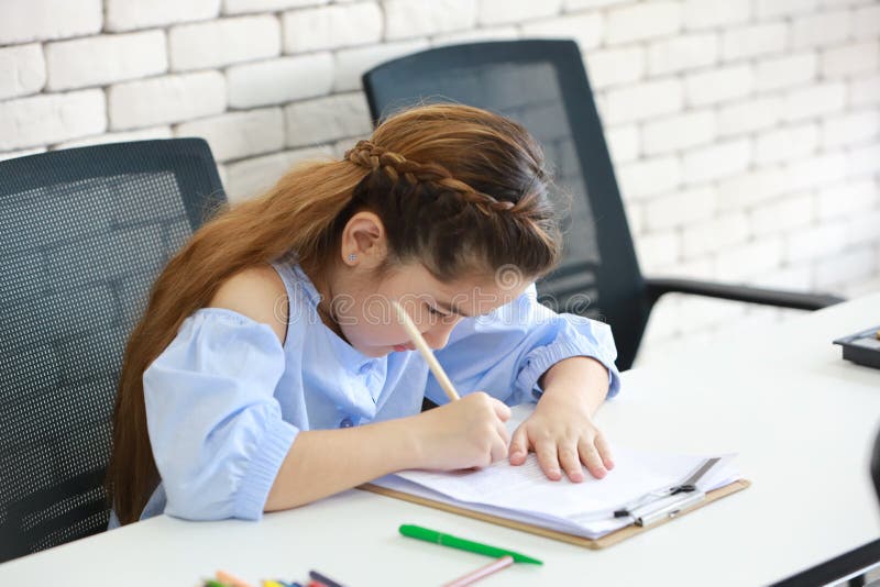 Two Smart Girls Sitting and Studying in Classroom Education Concept ...