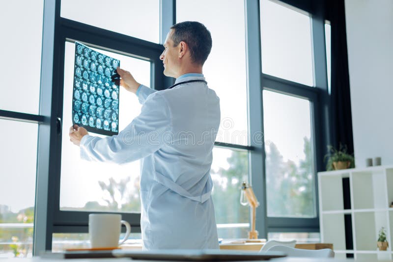 Smart Skillful Doctor Standing Near the Window Stock Image - Image of ...