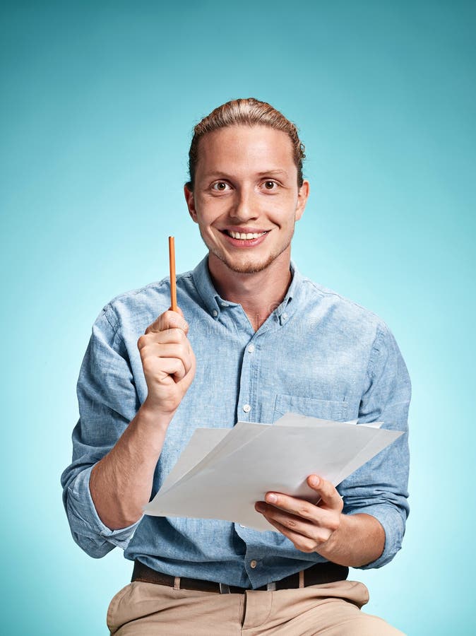 Smart Smiling Student with Great Idea Holding Notebook Stock Image ...