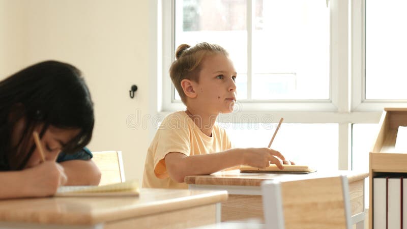 Smart Student Answer Teacher& X27;s Question while Sitting at Classroom ...