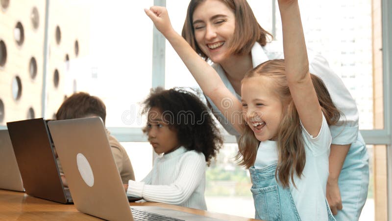 Student Celebrate Successful Project while Teacher Looking at Screen. Erudition. Stock Photo ...