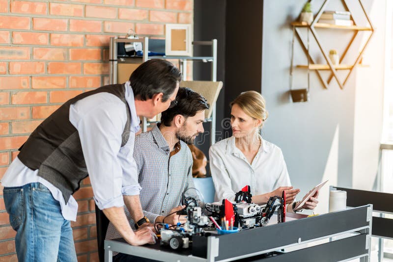 Smart Team Working Together in Office Stock Image - Image of male ...