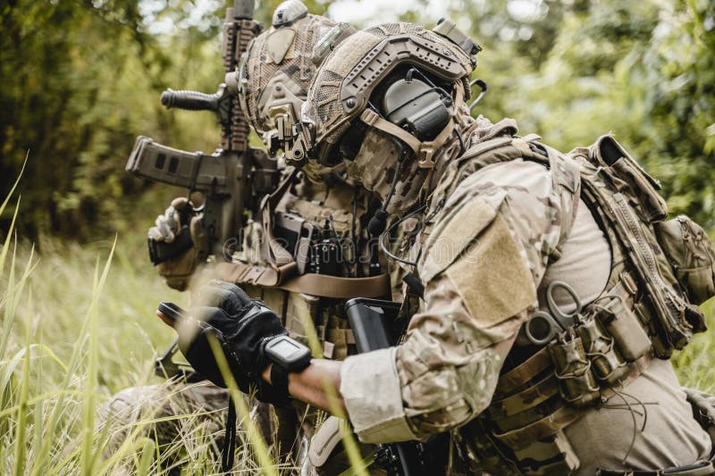 Expert Team of Soldiers Attacking Enemy during Military Operation Stock ...