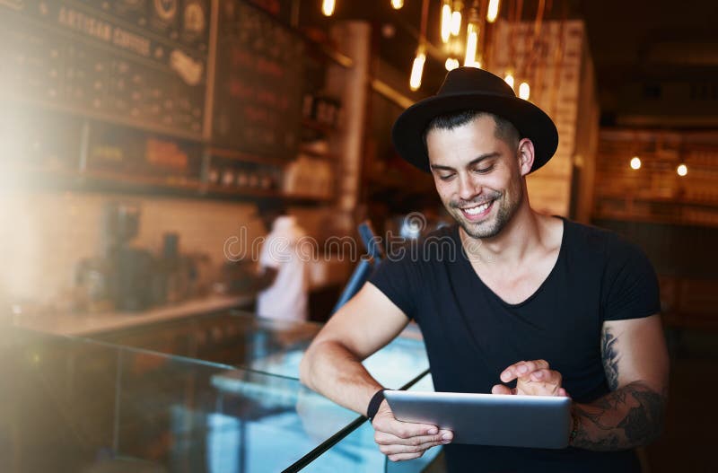 With Smart Technology, the Cafe Practically Runs Itself. a Young Man ...