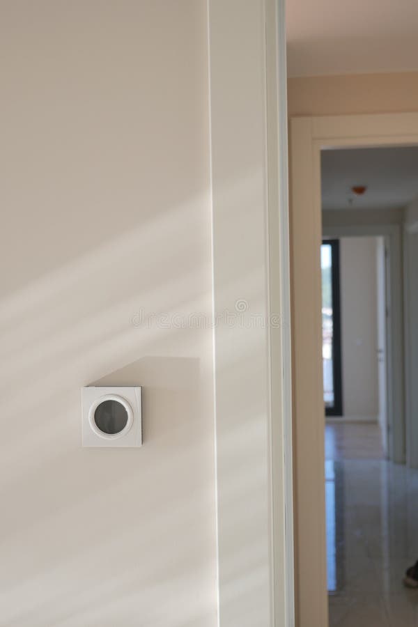 Smart Thermostat on White Wall for Optimal Home Temperature Control ...