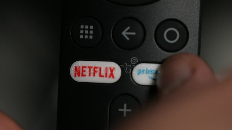 Smart Tv Controller with Netflix and Prime Video Buttons. User is ...
