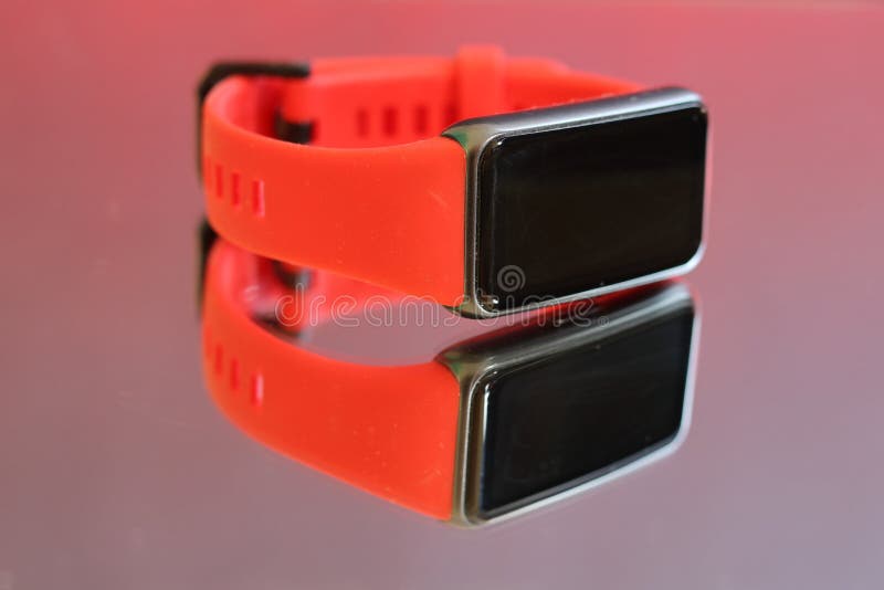 A Smart Watch with a Red Strap. Mirror Reflection Stock Photo - Image ...