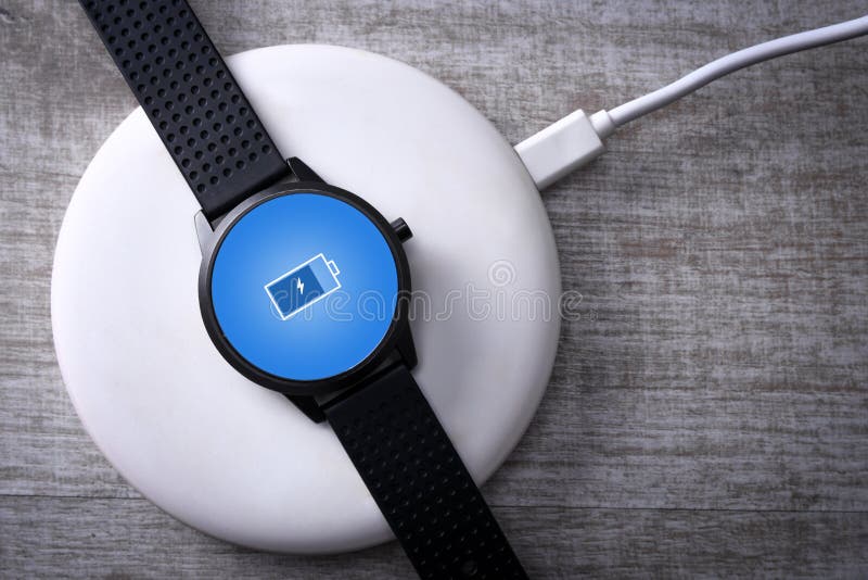 Smart Watch on Wireless Charging with on-screen Charging Indicator. at ...