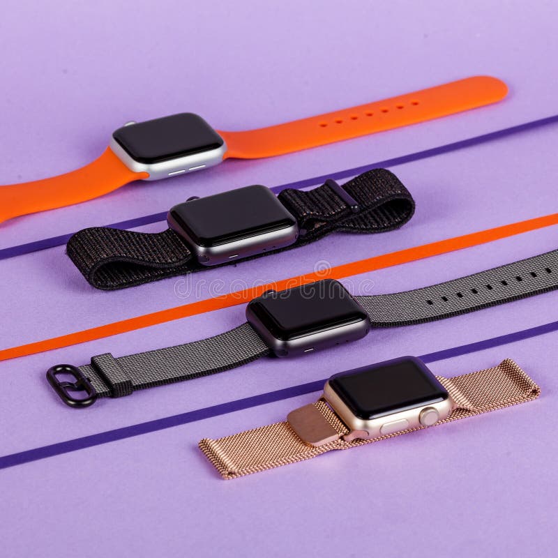 Smart Watches with Different Straps on Colorful Background Stock Photo ...