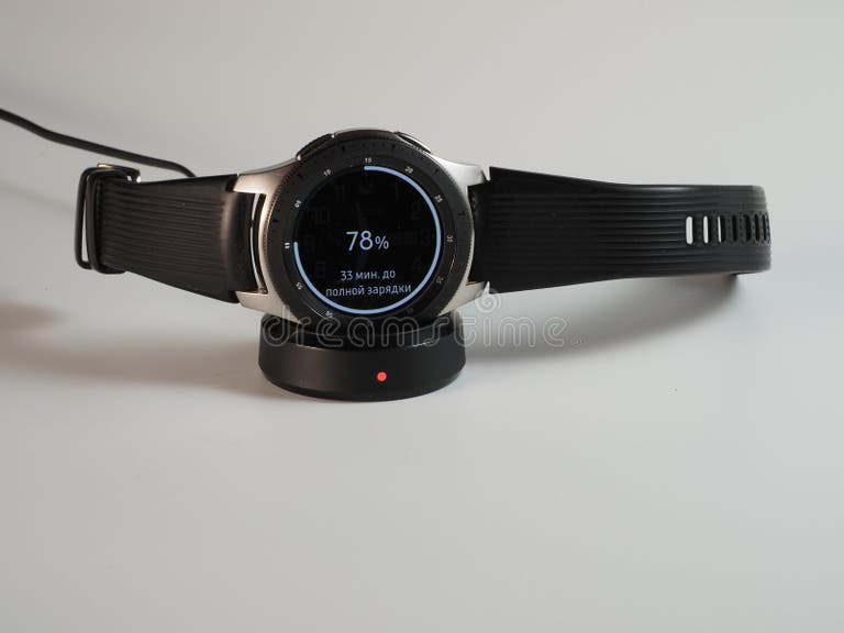 Smart Watches with Wireless Charging Stock Photo - Image of cordless ...