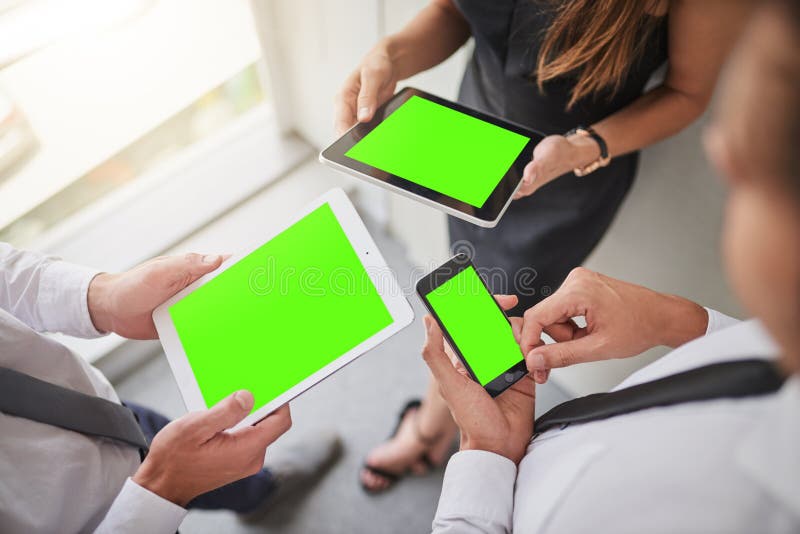 The Smart Way of Networking. a Group of Colleagues Using Their Smart ...