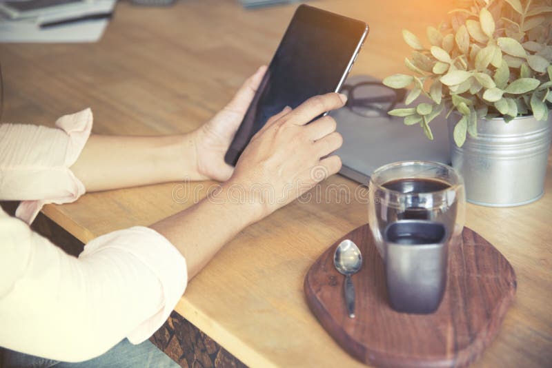 Smart Woman Using Tablet after Work at the Coffee Shop Stock Photo ...