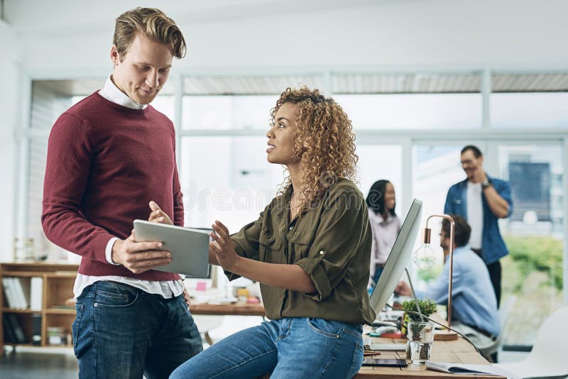 The Smart Working Team is a Hardworking Team. Two Young Colleagues ...