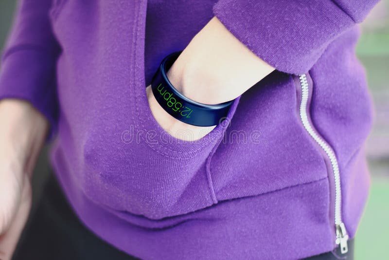 Smart wristband with hand. stock photo. Image of concept - 86364220