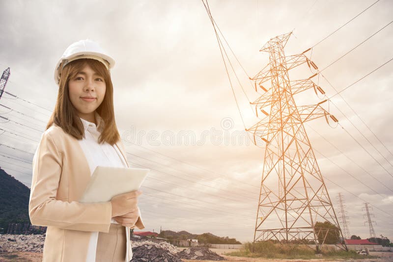 Smart Young Beautiful Electrical Engineer Woman Working Using Tablet ...