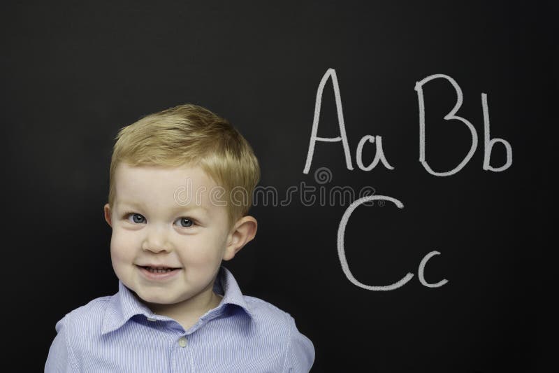 Smart Young Boy Stood Infront of a Blackboard Stock Image - Image of ...