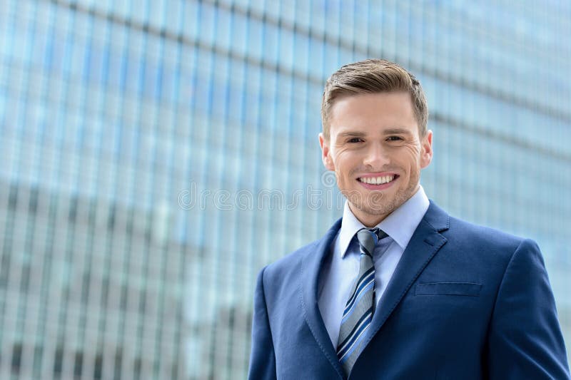 Smart Young Businessman Looking at Camera Stock Photo - Image of ...