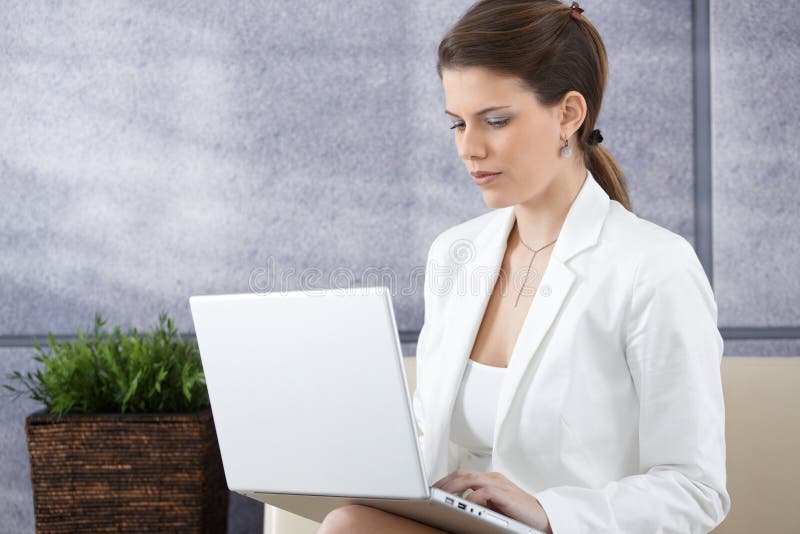 Smart Young Businesswoman with Laptop Stock Image - Image of formal ...