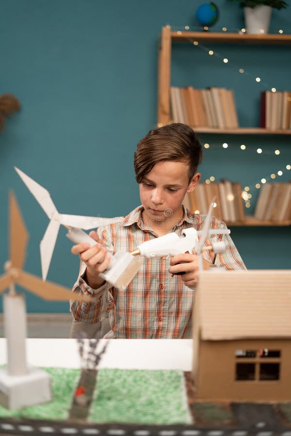 Smart Young Child Work Making Wind Turbines Project at Home. Boy ...