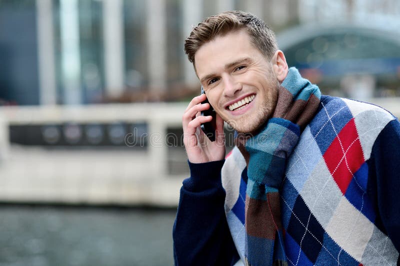 Smart Young Man Talking Via Cell Phone Stock Photo - Image of irish ...