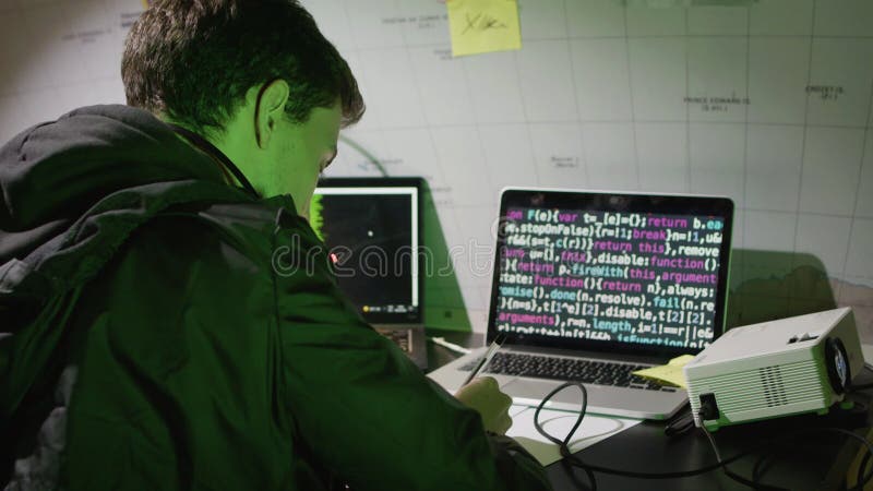 Smart Young Man Working on Laptop, Making Notes Stock Footage - Video ...