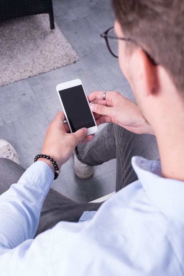 Smart Young Professional Looking on His Smartphone Stock Photo - Image ...