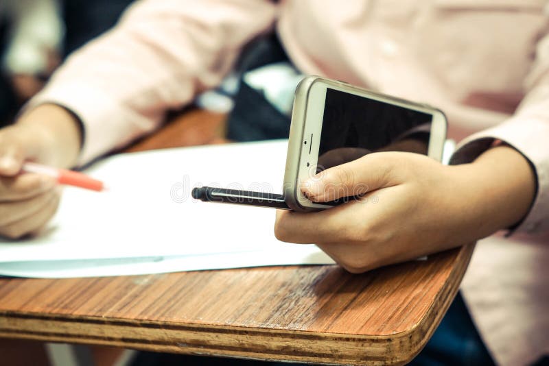 Smartphone addiction stock photo. Image of class, student - 74993428