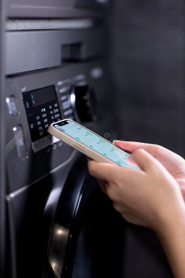 Smartphone with App Used To Control Washing Machines Stock Image ...