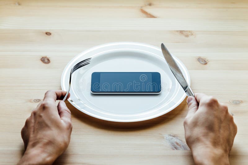 Smartphone at the Blank Plate Stock Photo - Image of fork, media: 69312934