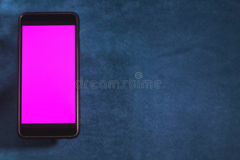 Smartphone with Blank Purple Screen on Blue Velvet Background. Stock ...