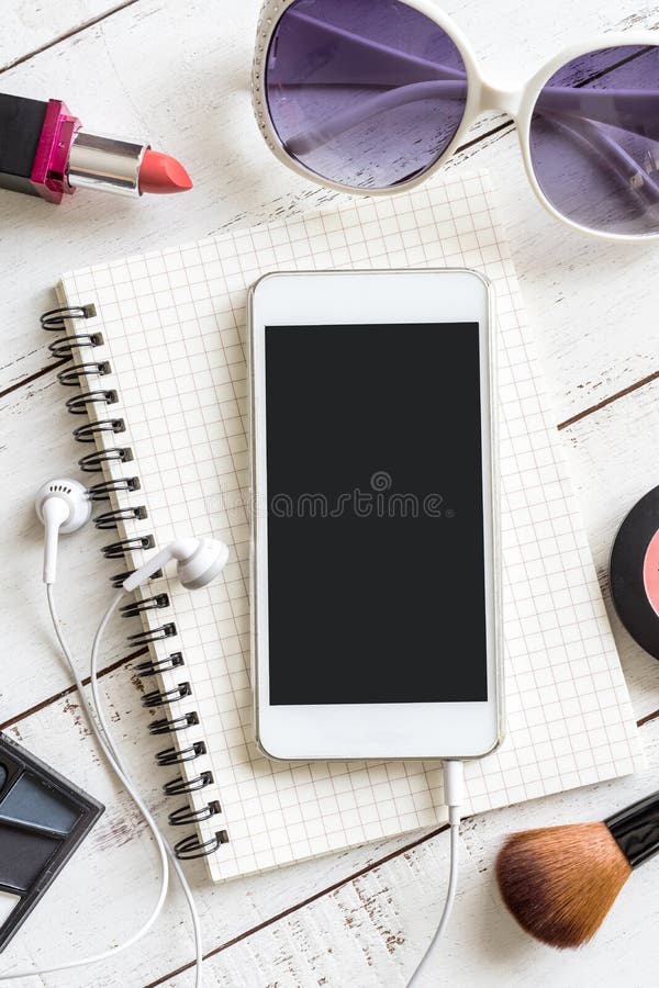 Smartphone with Blank Screen on Notebook and Makeup Stock Image - Image ...