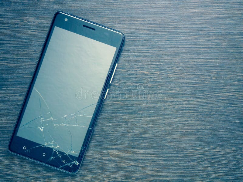 Smartphone with Broken Display on Wooden Table Stock Image - Image of ...