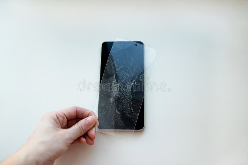 Smartphone with Broken Protective Glass after Falling. Stock Image ...