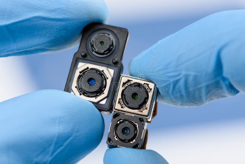 Smartphone Camera Modules in Scientist Hands. Different Modern Sensor ...