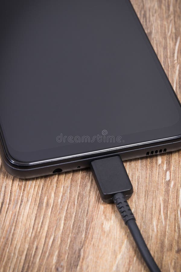 Smartphone with Connected Plug of Charger. Telephone Charging Stock ...