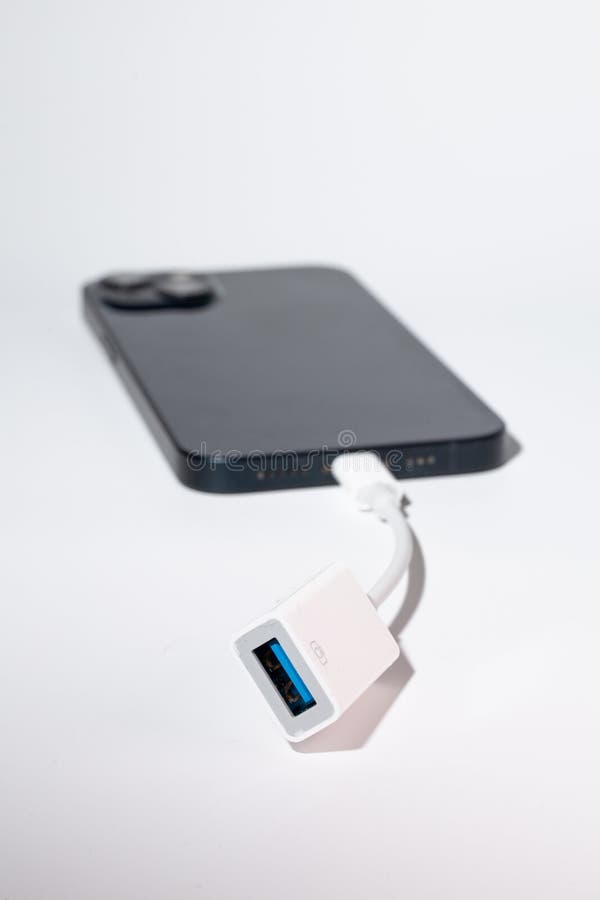 A Smartphone Connected To a USB Adapter As a Portable Communication ...