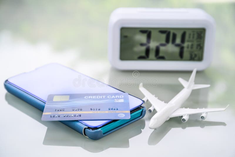 Smartphone with Credit Card and Digital Clock on Deck Stock Image ...