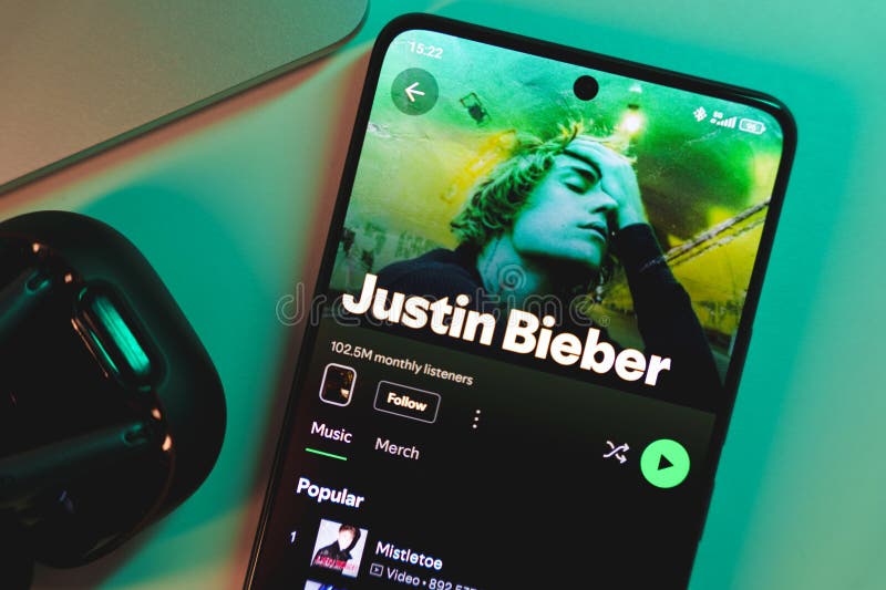 A Smartphone Displaying Justin Bieber S Artist Profile on Spotify. Editorial Stock Photo - Image ...