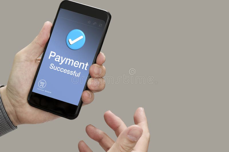 A Smartphone Displaying a Payment Successful Message, Held by a Person ...