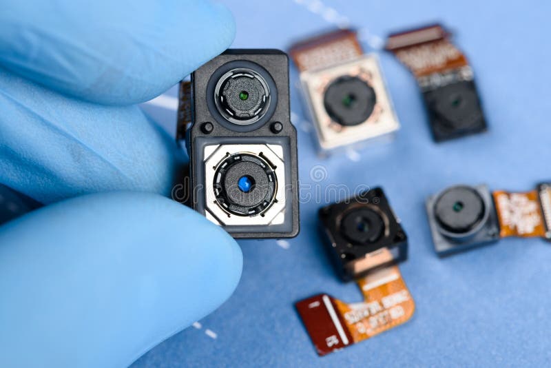 Smartphone Camera Modules in Scientist Hands. Different Modern Sensor ...