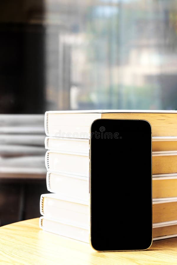 Smartphone with Empty Screen, Next To a Stack of Books. with Copy Space ...