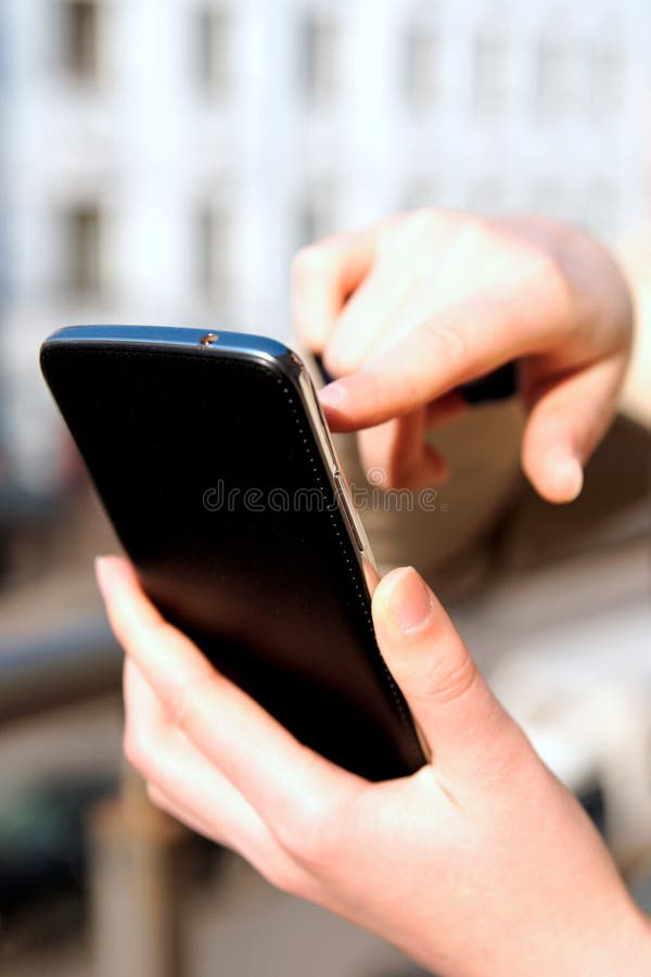 Smartphone stock photo. Image of holding, phone, connection - 54655354