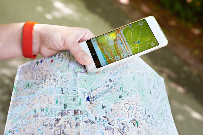 Smartphone with GPS Navigator and Map in Hand Stock Photo - Image of ...