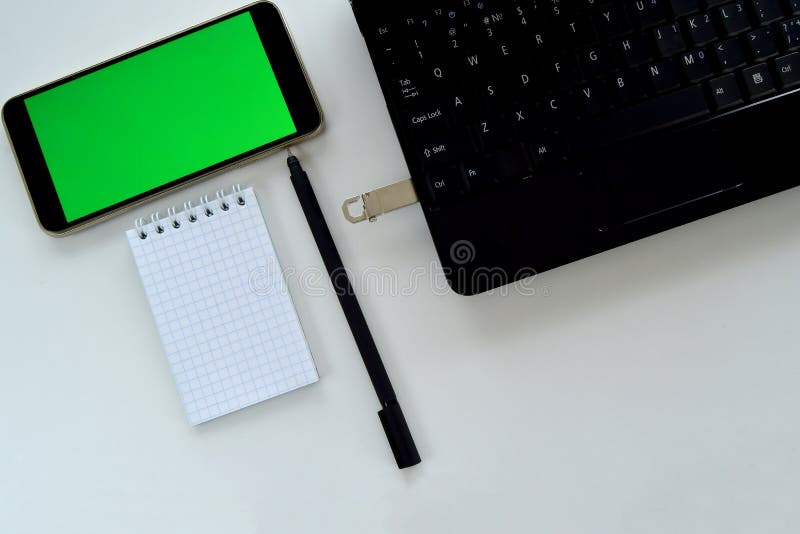 Smartphone Green Screen Mockup and Black Pen with Notepad. Technology ...