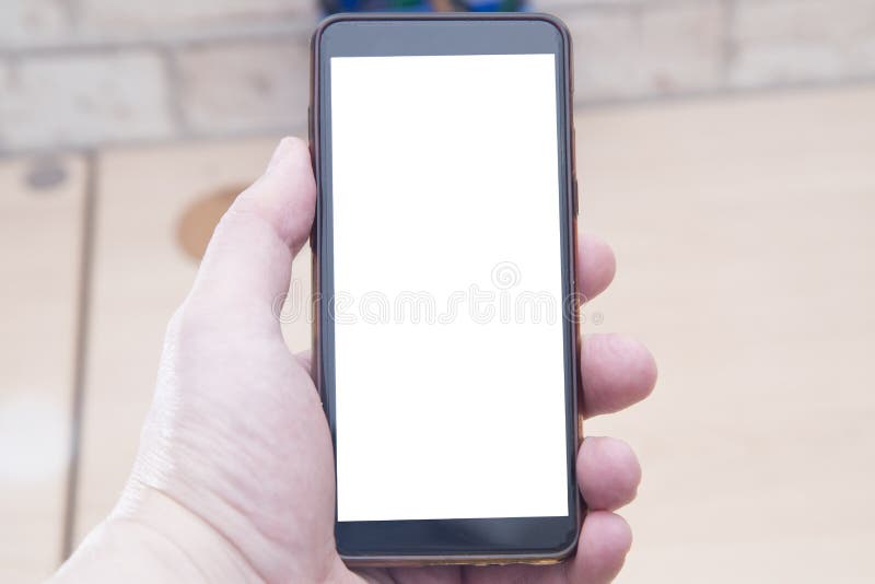 A Smartphone in the Hands of a Person.Using Your Smartphone for the ...