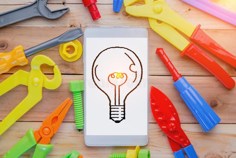 Smartphone with Lightbulb and Handy Tools Stock Image - Image of ...
